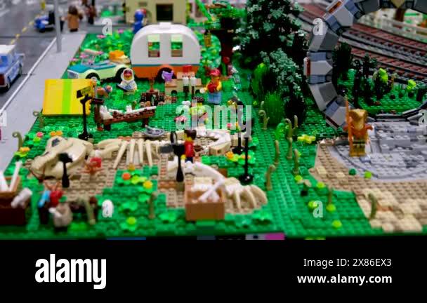 a city completely made of Lego blocks houses cars streets trains trams ...