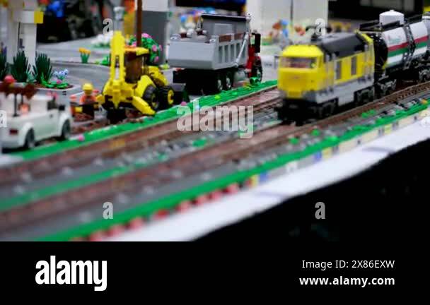 a city completely made of Lego blocks houses cars streets trains trams ...