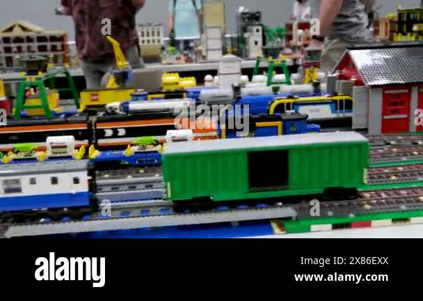 a city completely made of Lego blocks houses cars streets trains trams ...