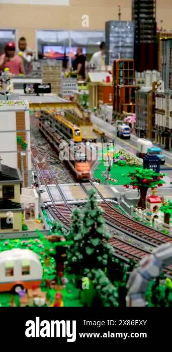 a city completely made of Lego blocks houses cars streets trains trams ...