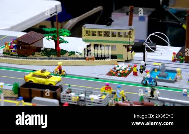 a city completely made of Lego blocks houses cars streets trains trams ...