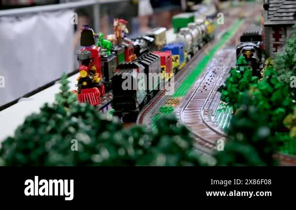 a city completely made of Lego blocks houses cars streets trains trams ...