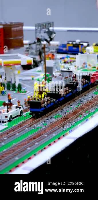 a city completely made of Lego blocks houses cars streets trains trams ...