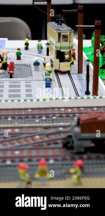 a city completely made of Lego blocks houses cars streets trains trams ...
