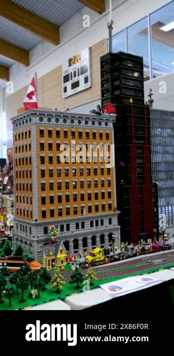 a city completely made of Lego blocks houses cars streets trains trams ...