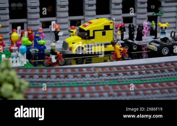 a city completely made of Lego blocks houses cars streets trains trams ...
