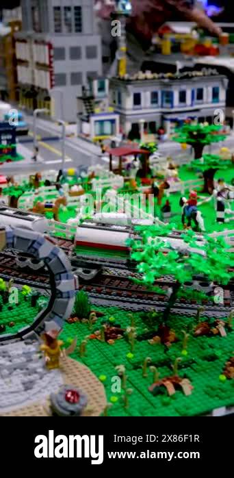 a city completely made of Lego blocks houses cars streets trains trams ...