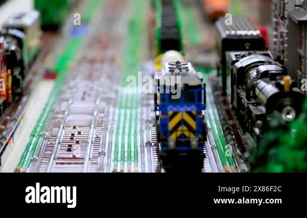 a city completely made of Lego blocks houses cars streets trains trams ...