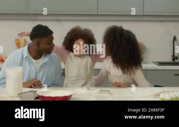 Happy loving cooking baking cook African American ethnic family mother ...