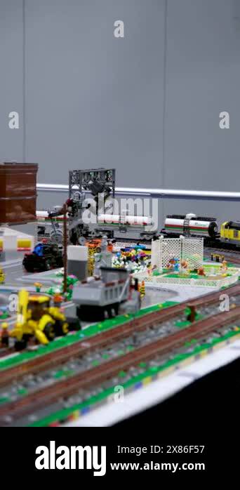 a city completely made of Lego blocks houses cars streets trains trams ...
