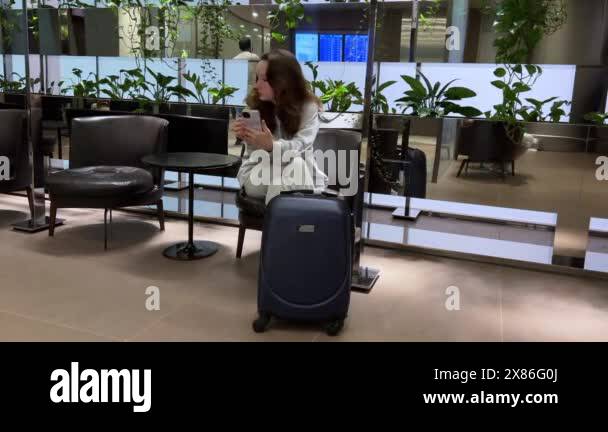 Move from terminal to another terminal in the rest area Shops boutiques people traveling waiting ...