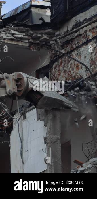 Demolition of the house previously destroyed by natural disaster ...