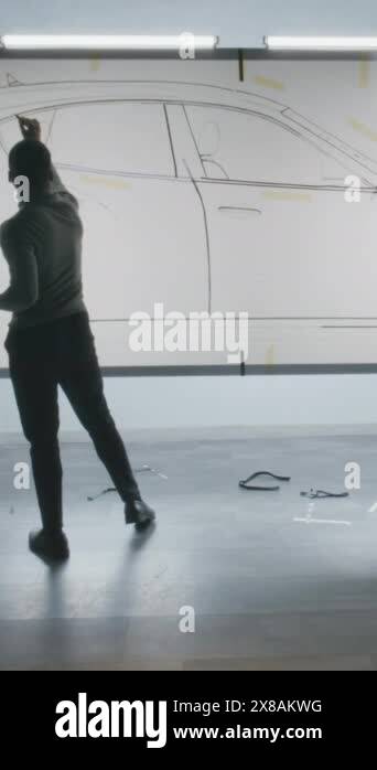 Back view of automotive african american male designer drawing sketch ...