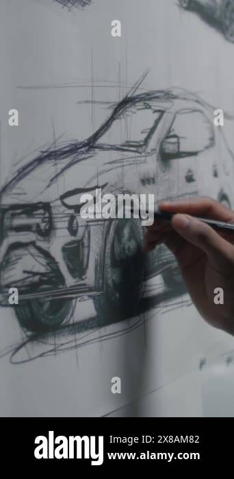Automotive african american male designer drawing sketch blueprint with ...