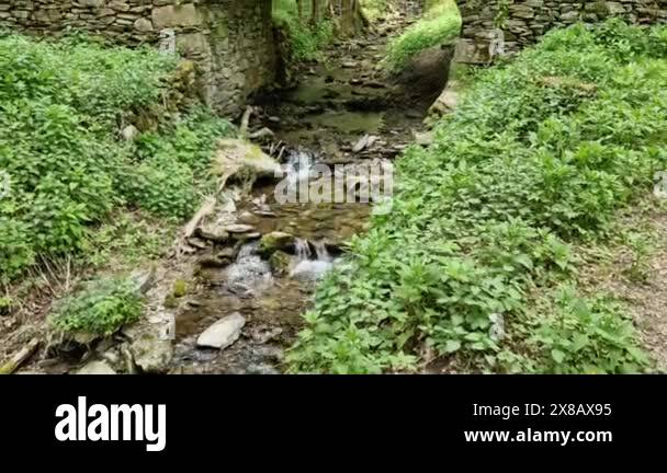 arch bridge, stone granite with railings to the arch. english landscape ...