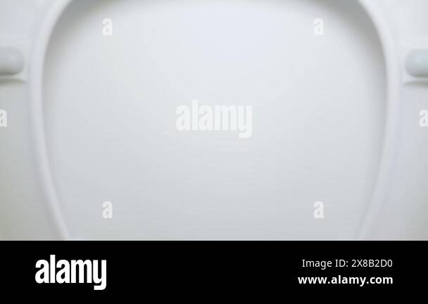 Unhappy woman picks up mobile phone that fallen into water in toilet ...