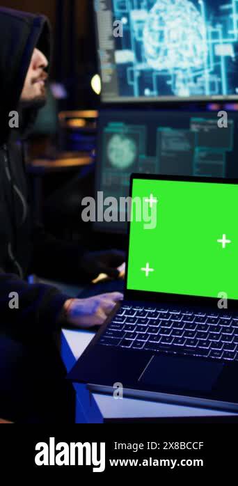 Vertical video Isolated screen laptop used by cybercriminal in ...
