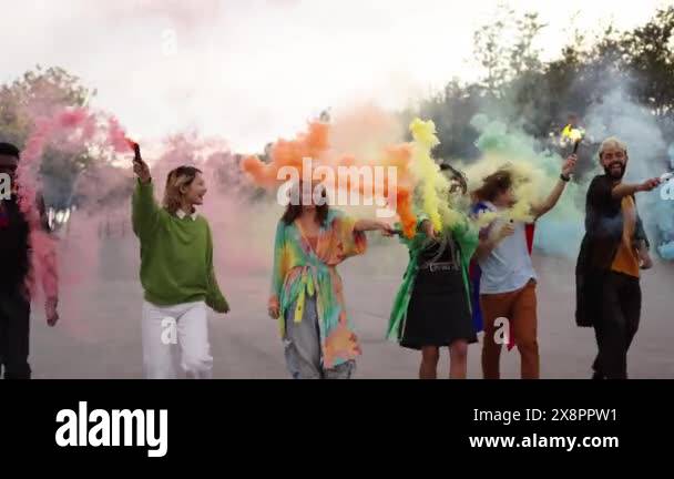 LGBT young people excited walking, jumping and dancing celebrating with ...