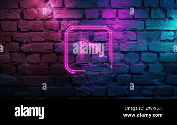 Video footage of Pink glowing Play button Icon neon icon on brick wall ...