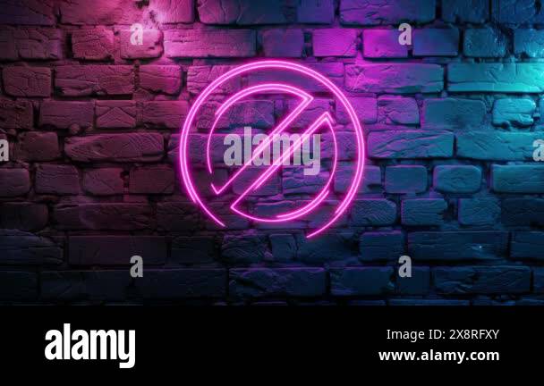 Video footage of Pink glowing Not Allowed, Stop Icon neon icon on brick ...