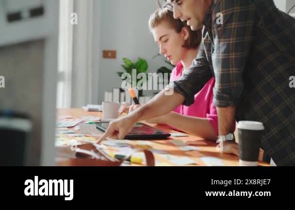 Smart project manager working together with businessman choosing logo ...