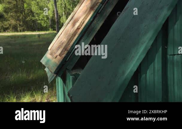 a man gets water from an old village well. Extraction of fresh water ...