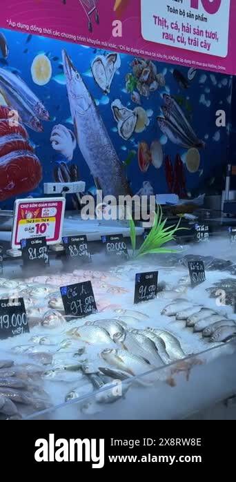 In the supermarket, the fish department, fish and seafood with prices ...