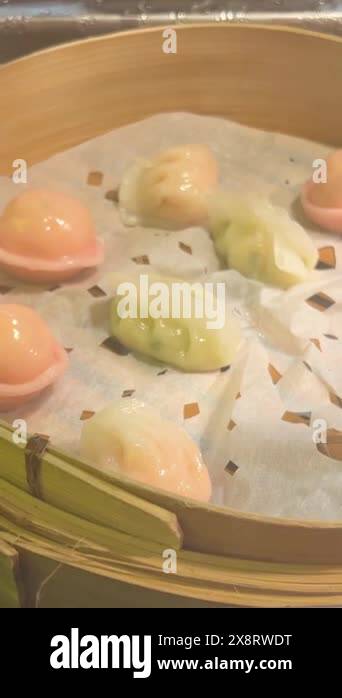 Steamed meat bun on hot steam pot, Hot steamed pork bun in bamboo ...