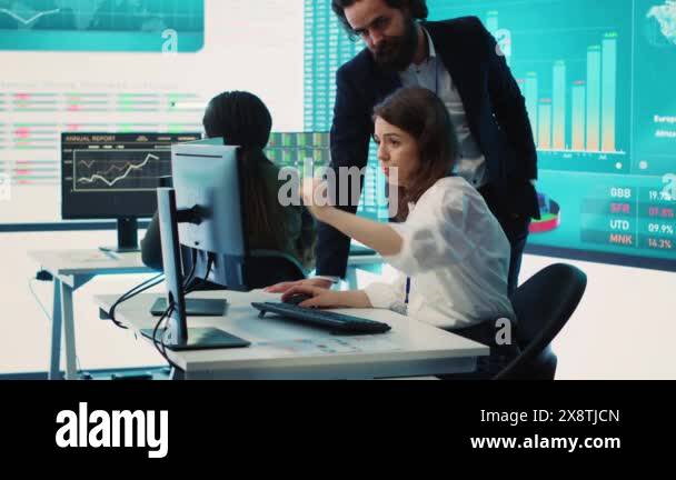 Enterprise colleagues reviewing project updates and details in ...