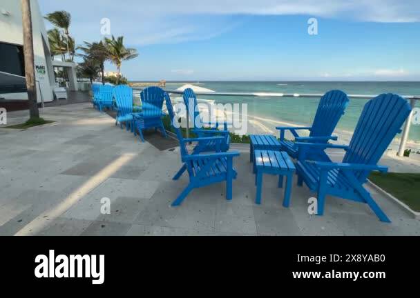Cancun, Mexico; May 24, 2024: Perfect blue seats to relax on a white ...