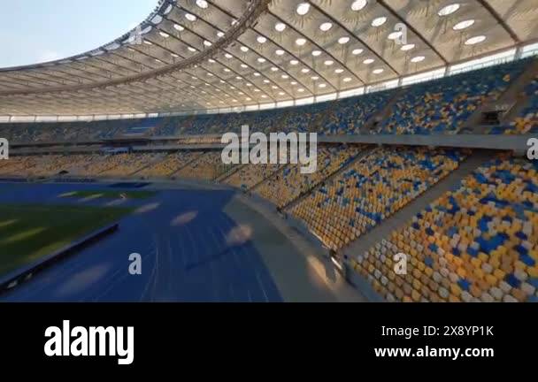 FPV flight, Stadium. cityscape time of day night. The view from the top ...