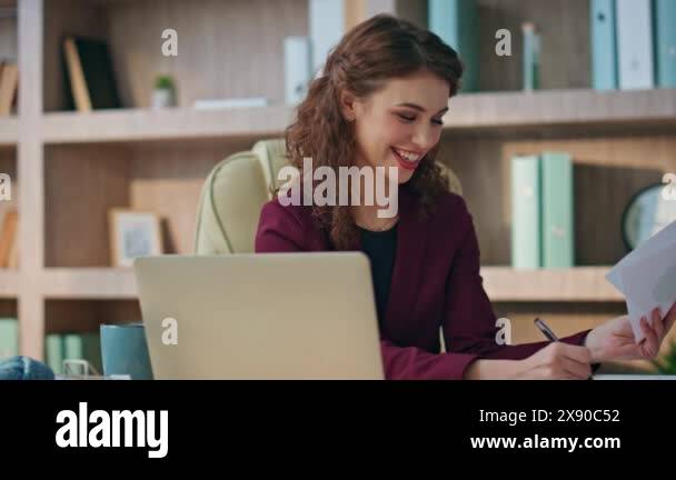 Successful executive talk videocall at modern workplace. Smiling ...