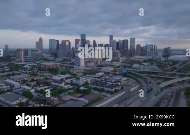 Aerial view of Houstons skyline at dawn, featuring iconic buildings and ...