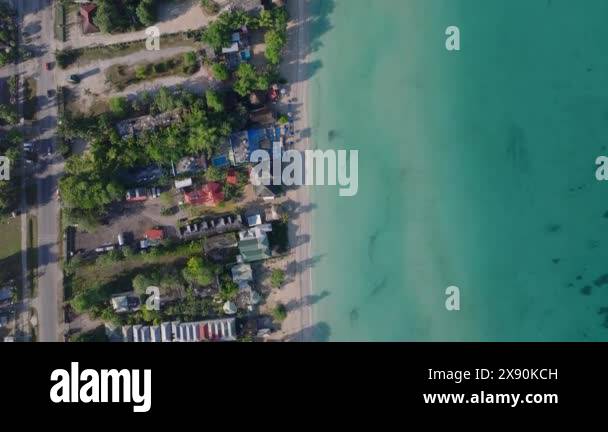 Jamaicas coastal beachfront, with transparent water and white sand ...