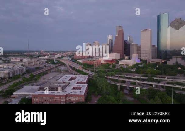 Lively Houston skyline at dusk, highlighting the citys famous ...