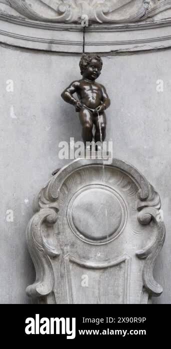 Manneken Pis, a renowned bronze sculpture and fountain in Brussels ...