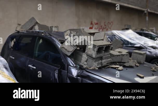 Consequences of devastating earthquake and car was buried under rubble ...