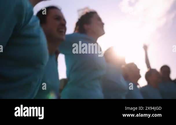 Celebrating cheering smiling arms raised group team Stock Videos ...