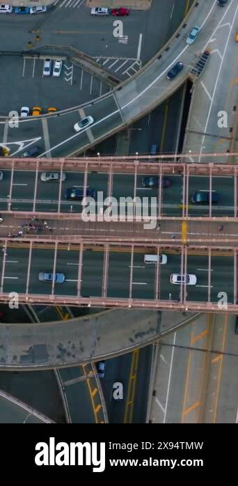 Busy traffic of big city. Multiple cars running through the roads and ...