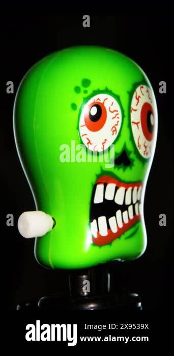 mechanical wind-up toy monsters in vertical Stock Video Footage - Alamy