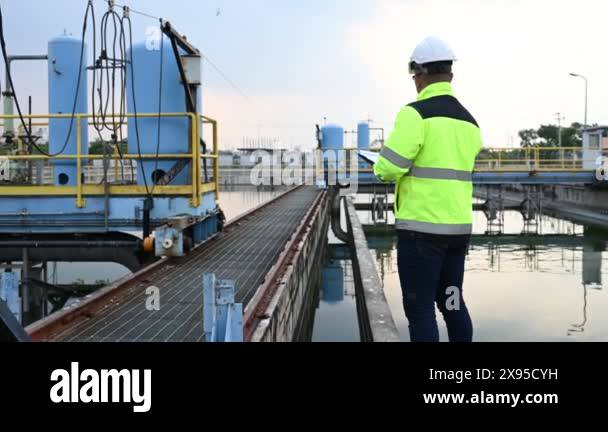 Environmental engineer work at wastewater treatment plant,Water supply engineering working at ...
