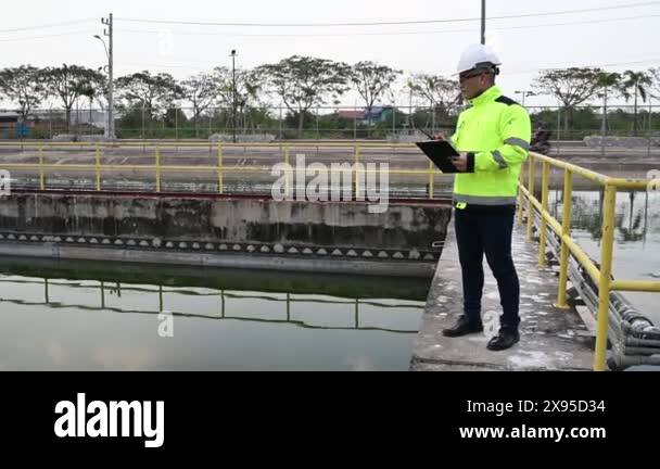 Environmental engineer work at wastewater treatment plant,Water supply ...