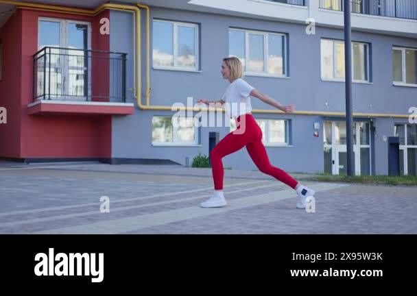 Side view and full-length portrait of nimble caucasian female making ...