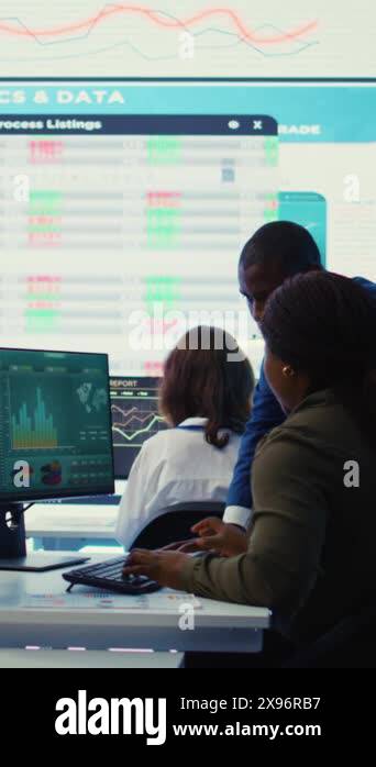 Vertical Video Financial analyst works on resource allocation plans ...