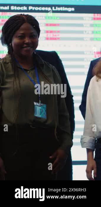 Vertical Video Diverse group of business professionals posing together ...