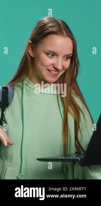 Vertical video Smiling woman having friendly conversation with friends ...