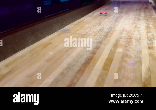 Closeup of Weights on Shuffleboard Table. Slow motion shuffle board ...