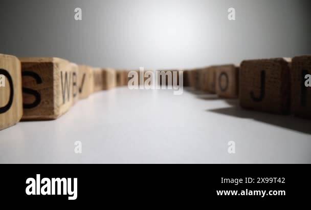 Wooden cubes with letters of English alphabet on table. Alphabet ...