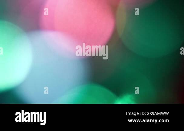 Abstract blurry bokeh background. Colorful defocused particles bokeh with a blurred depth of ...