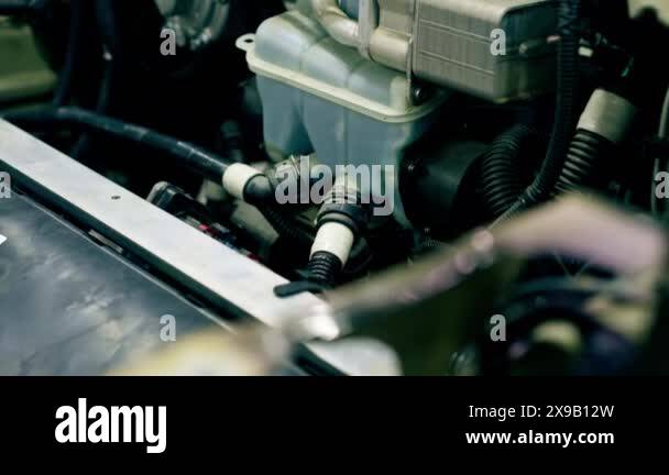 close-up At a service station an oil tank with tubes installed in the ...